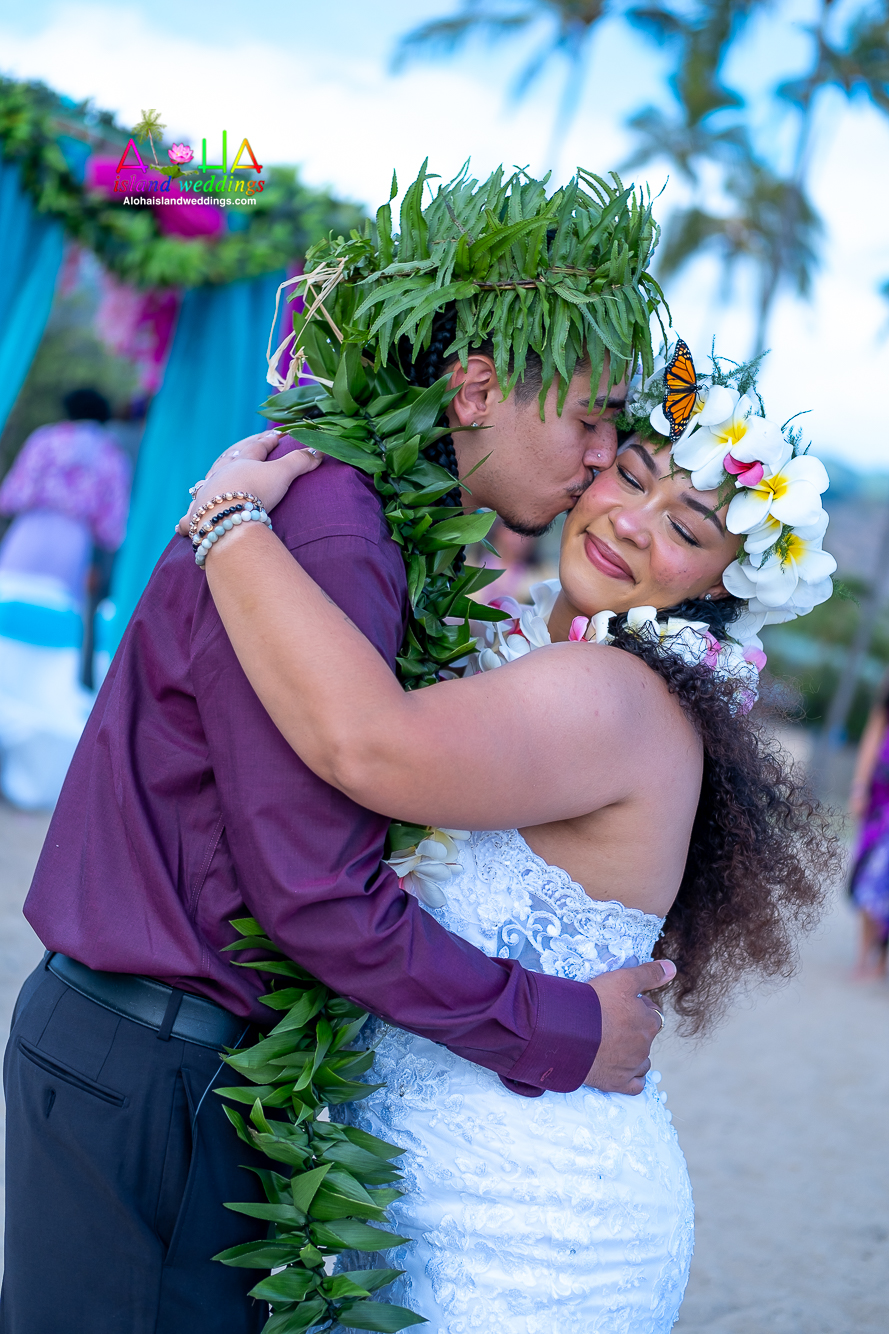 A kiss with a butterfly at marriage ceremony - Wedding in Hawaii